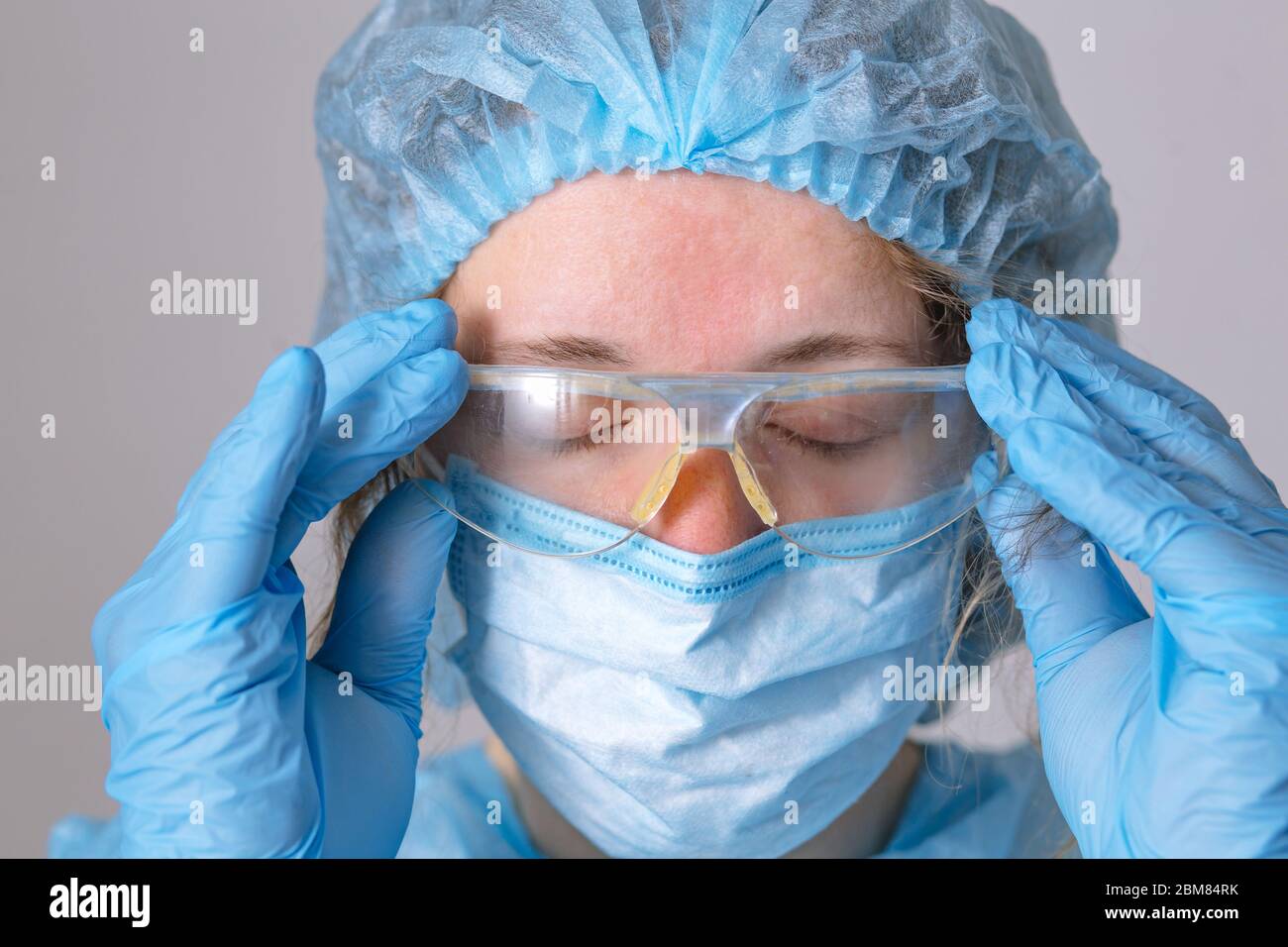 Tired doctor. Tired nurse at the hospital. The fight against the ...