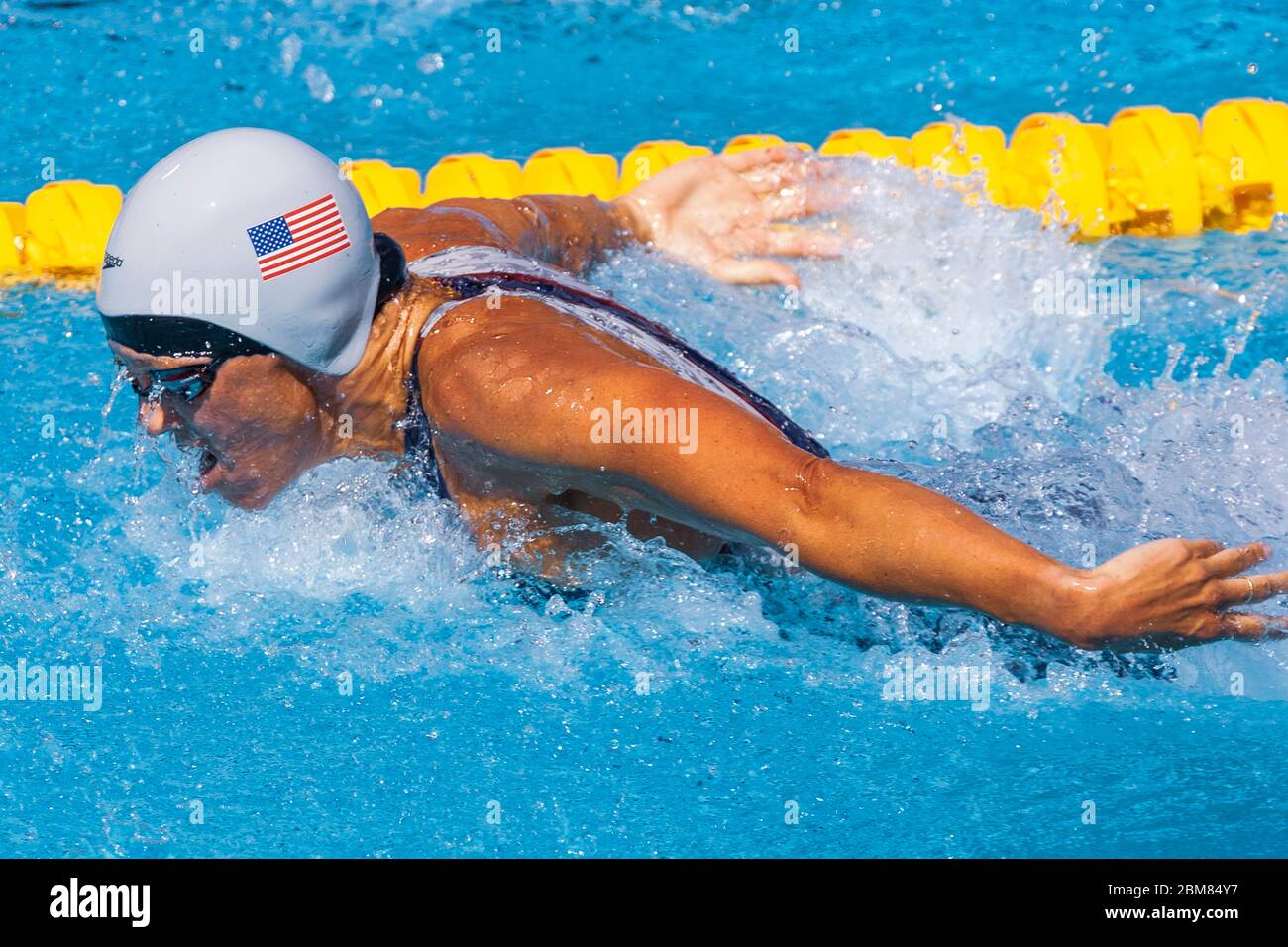 Jenny Thompson (USA) competes in the Women's 100 metre butterfly heat ...