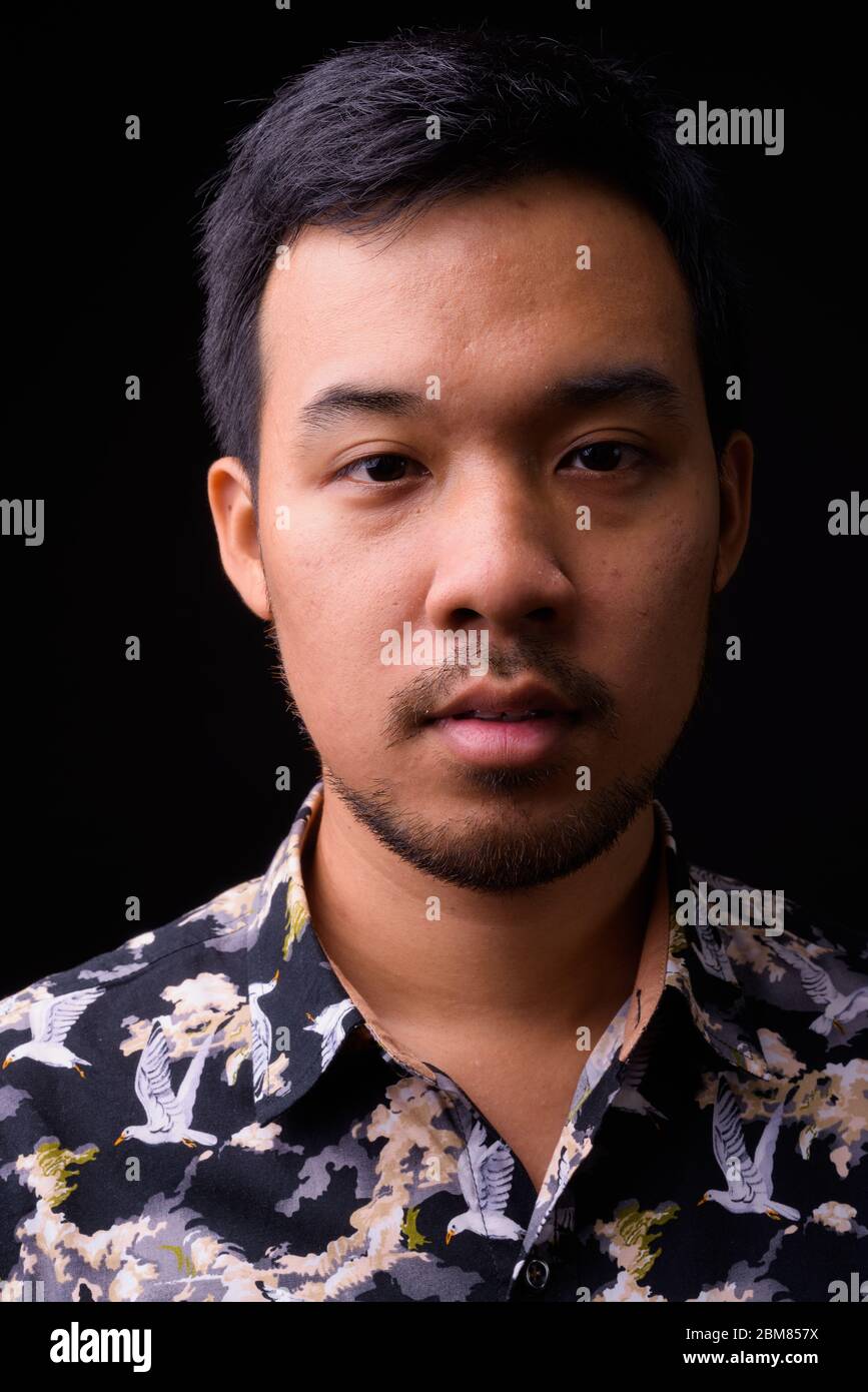Young asian male artist hi-res stock photography and images - Alamy