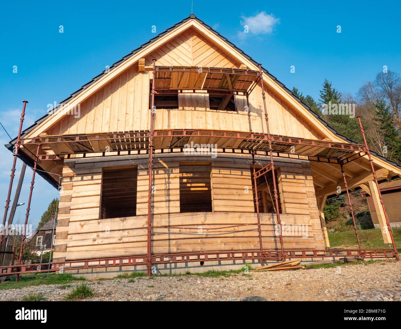Ecological family house onstruction. Lining the house of spruce boards ...