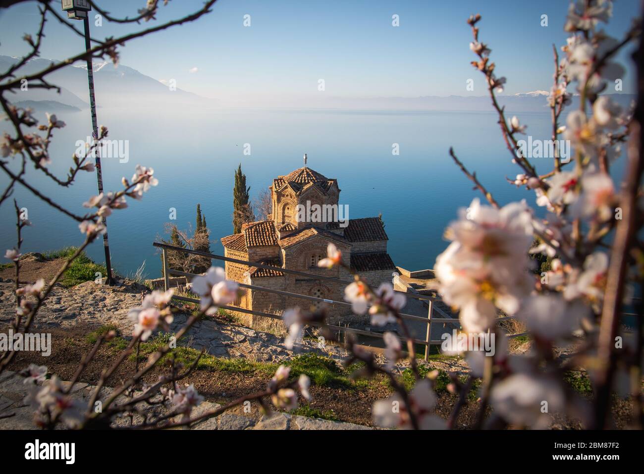 Church of Saint John at Kaneo in Ohrid with spring flowers, North ...