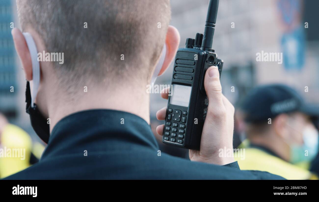 Police officer using equipment hi-res stock photography and images - Alamy