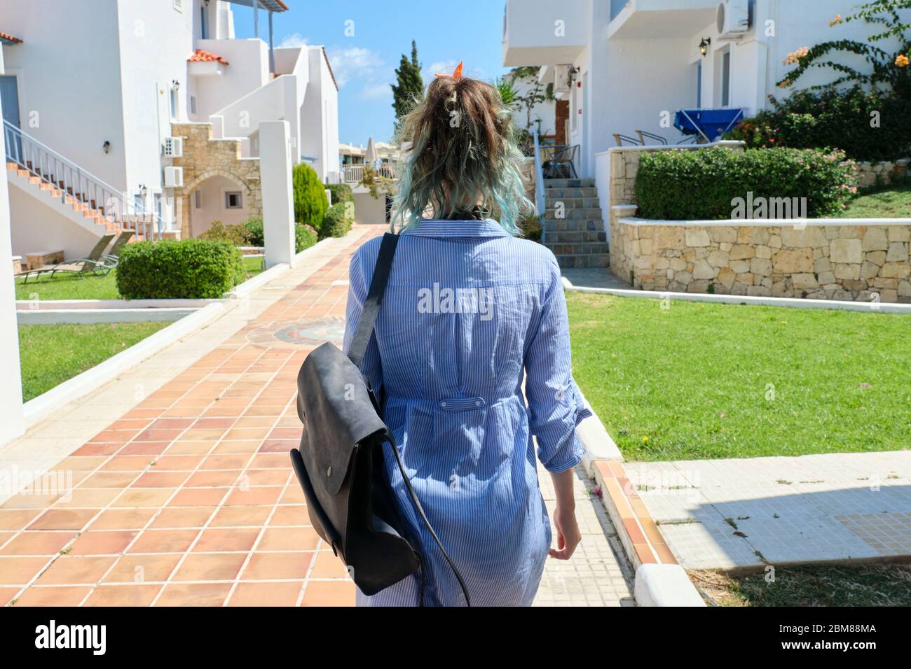 Summer portrait of walking beautiful teenager girl, back view Stock ...