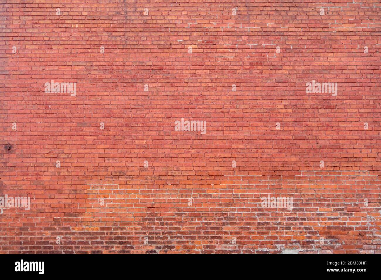 distant wide angle image of a red brick wall Stock Photo - Alamy