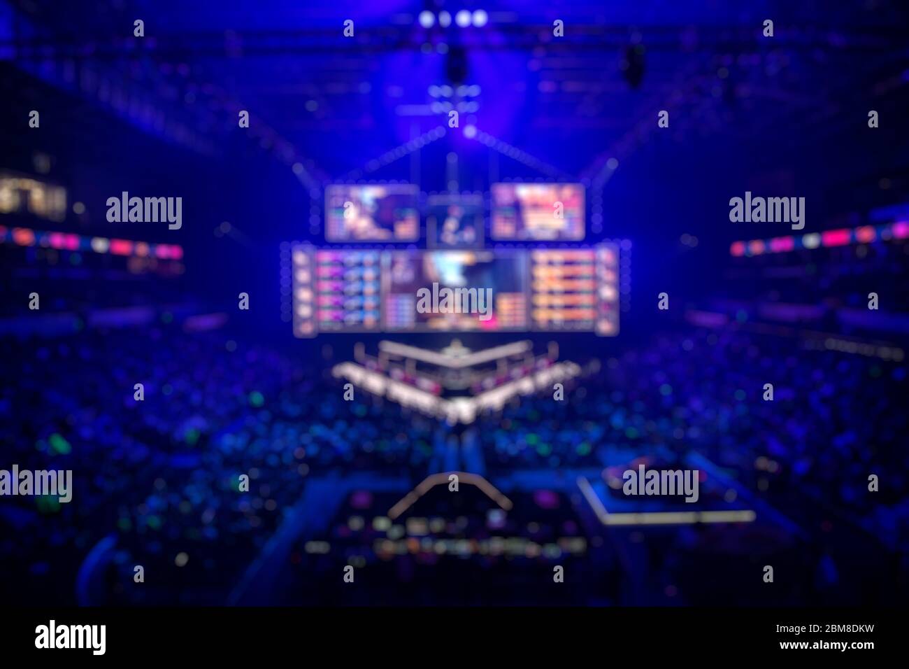 Blurred background of an esports event - Main stage venue, big screen ...