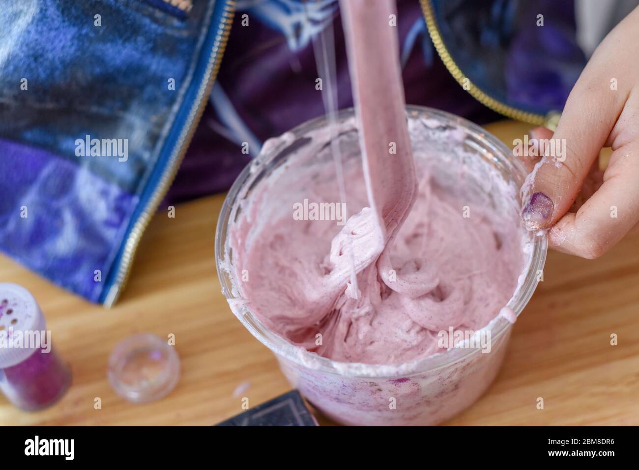 Kids have fun learning at home making slime in a creative science ...