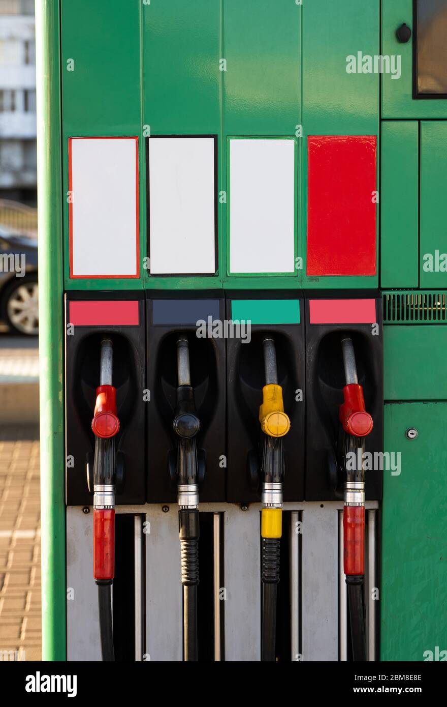 Four fuel pumps at a gas station Stock Photo - Alamy