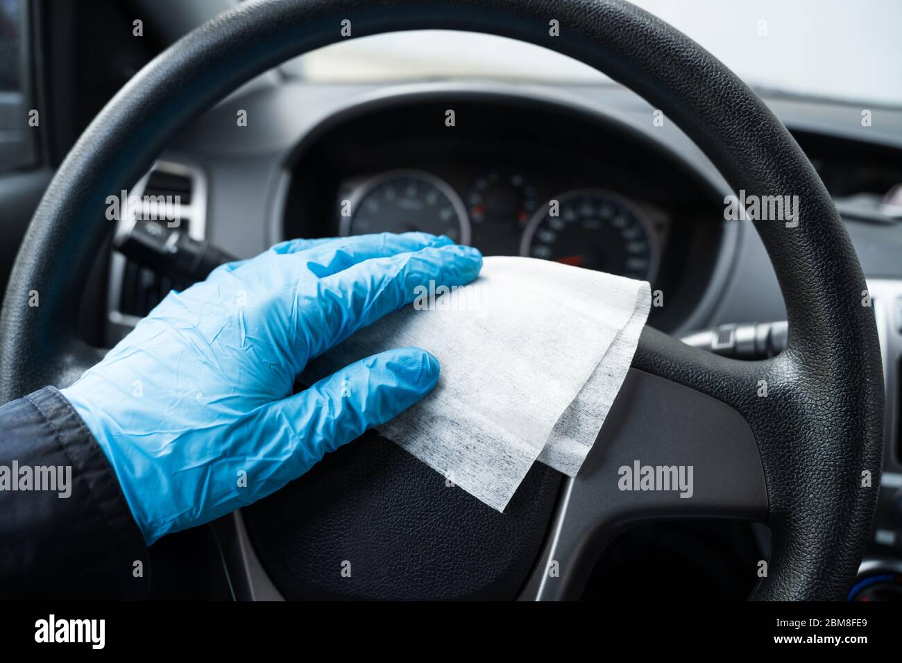 Cleaning Car With Sanitizer Wipe Against Virus Infection Stock Photo ...