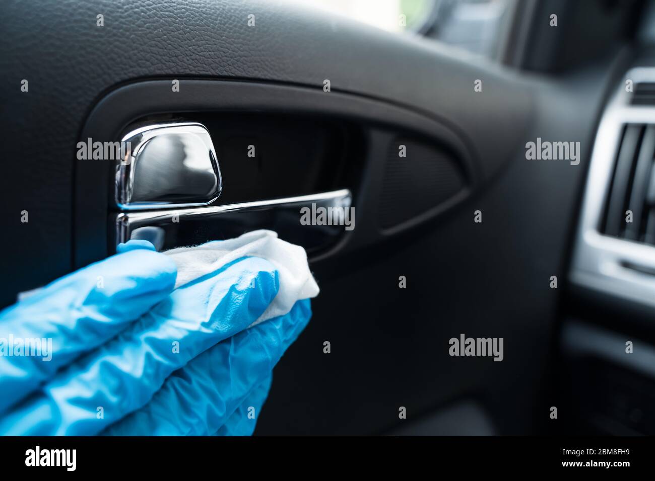 Cleaning Car Door Handle With Sanitizer Wipe Against Virus Infection ...