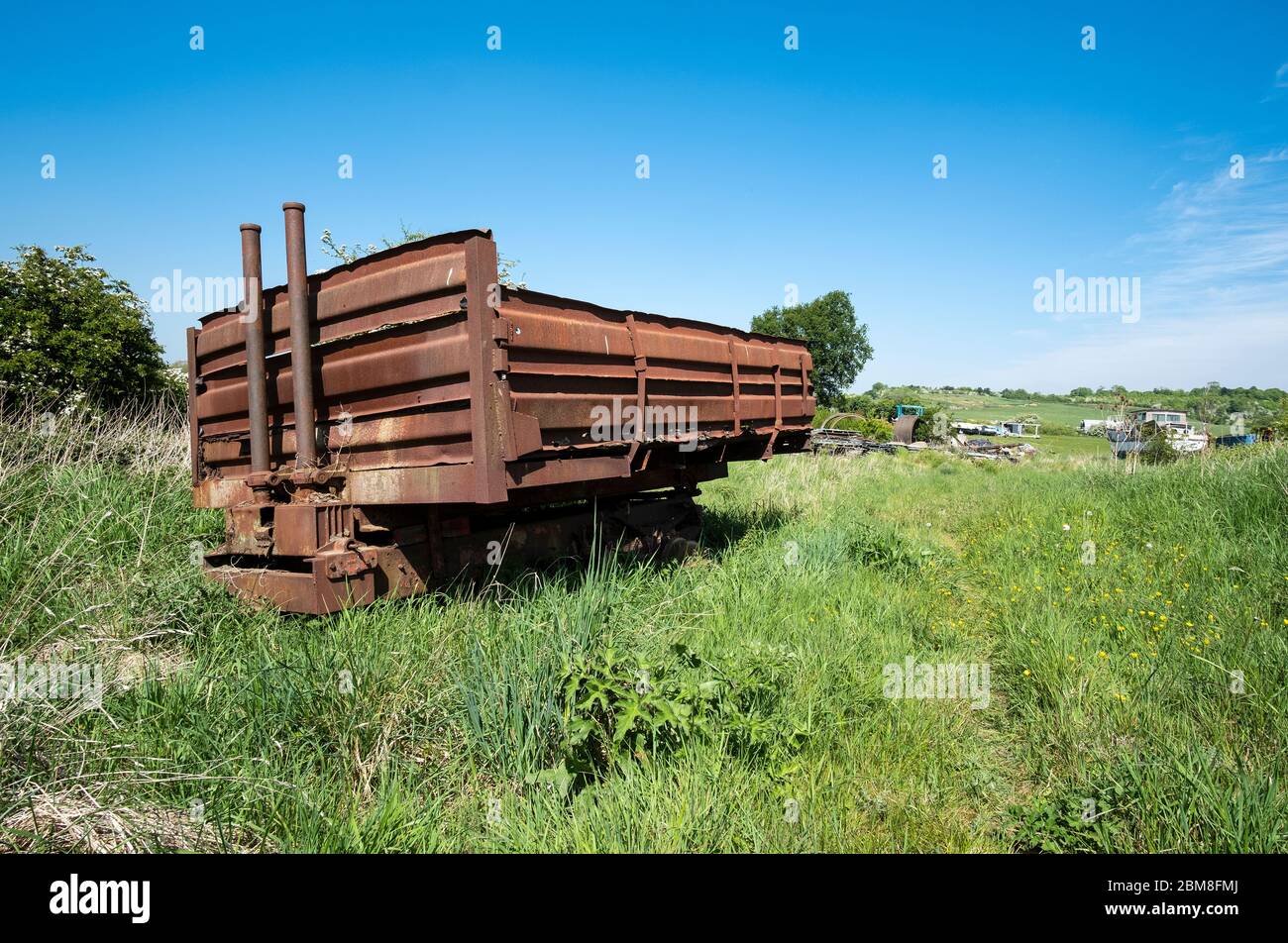 Old abandoned rusty metal trailer Stock Photo - Alamy
