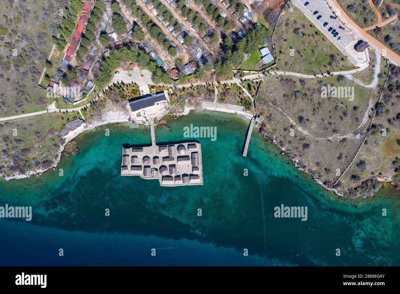 Aerial view of Museum on water in the Bay of Bones on the Ohrid Lake in ...