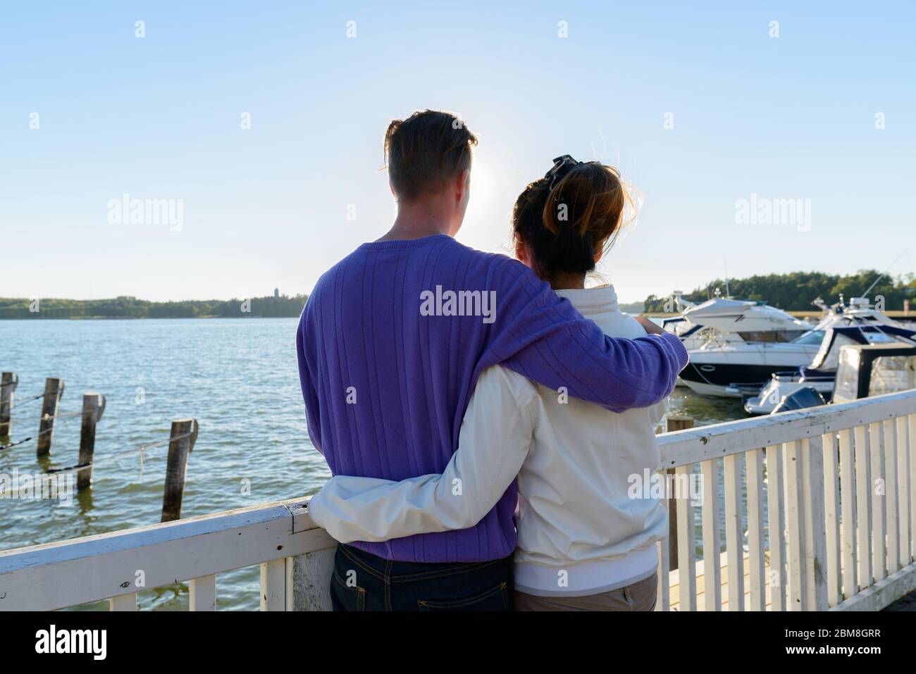 Two people hugging hi-res stock photography and images - Alamy