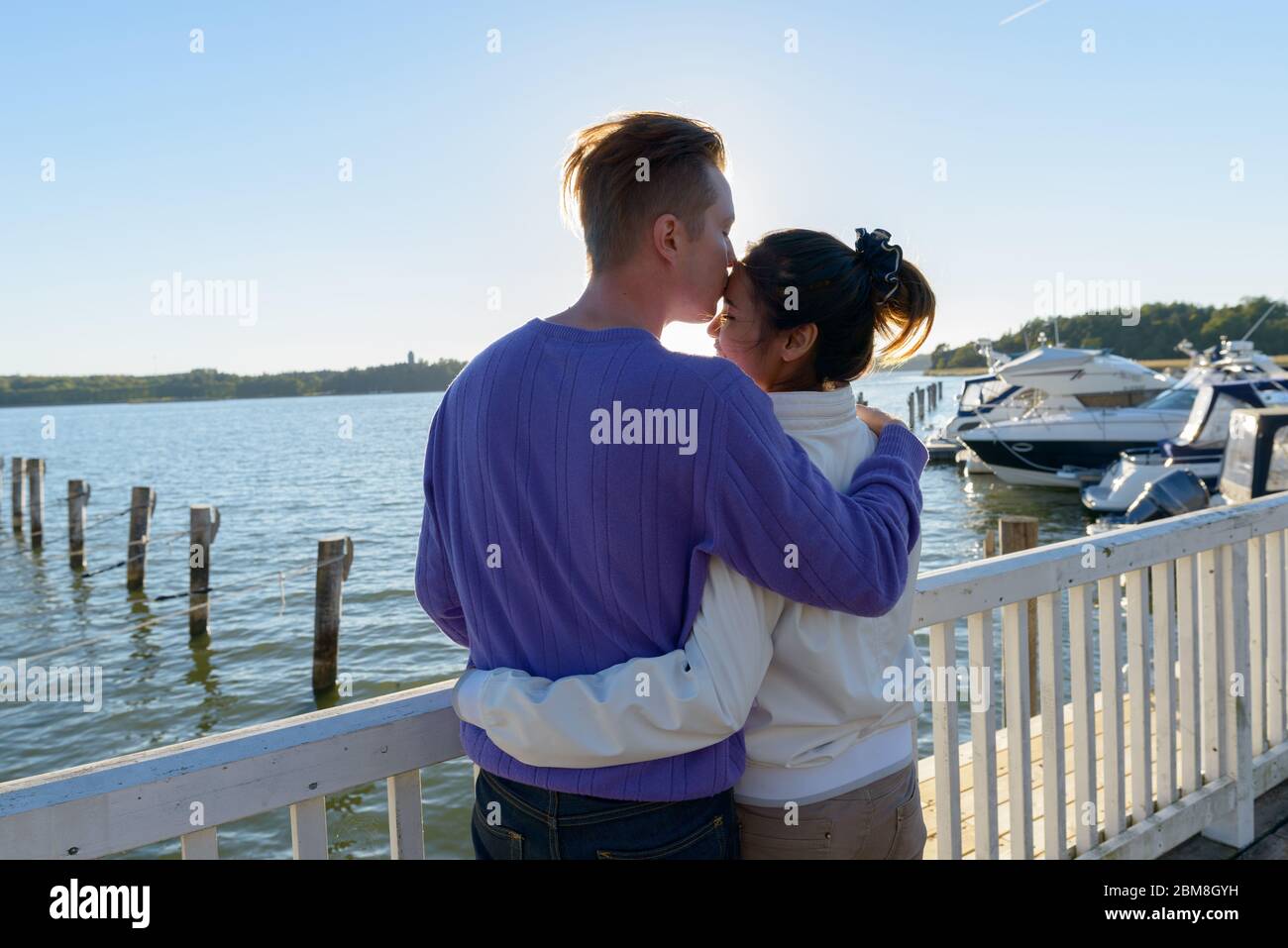 Two people kissing hi-res stock photography and images - Alamy
