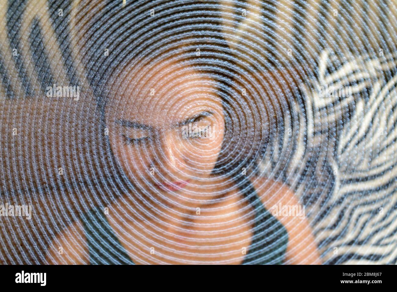 Double exposure of young beautiful Asian woman behind zebra pattern ...