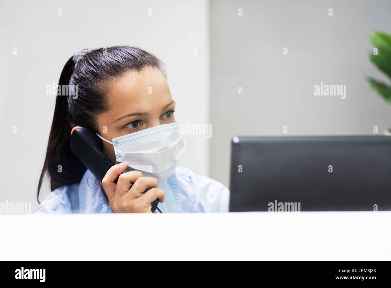 Woman wearing mask talking using hi-res stock photography and images ...