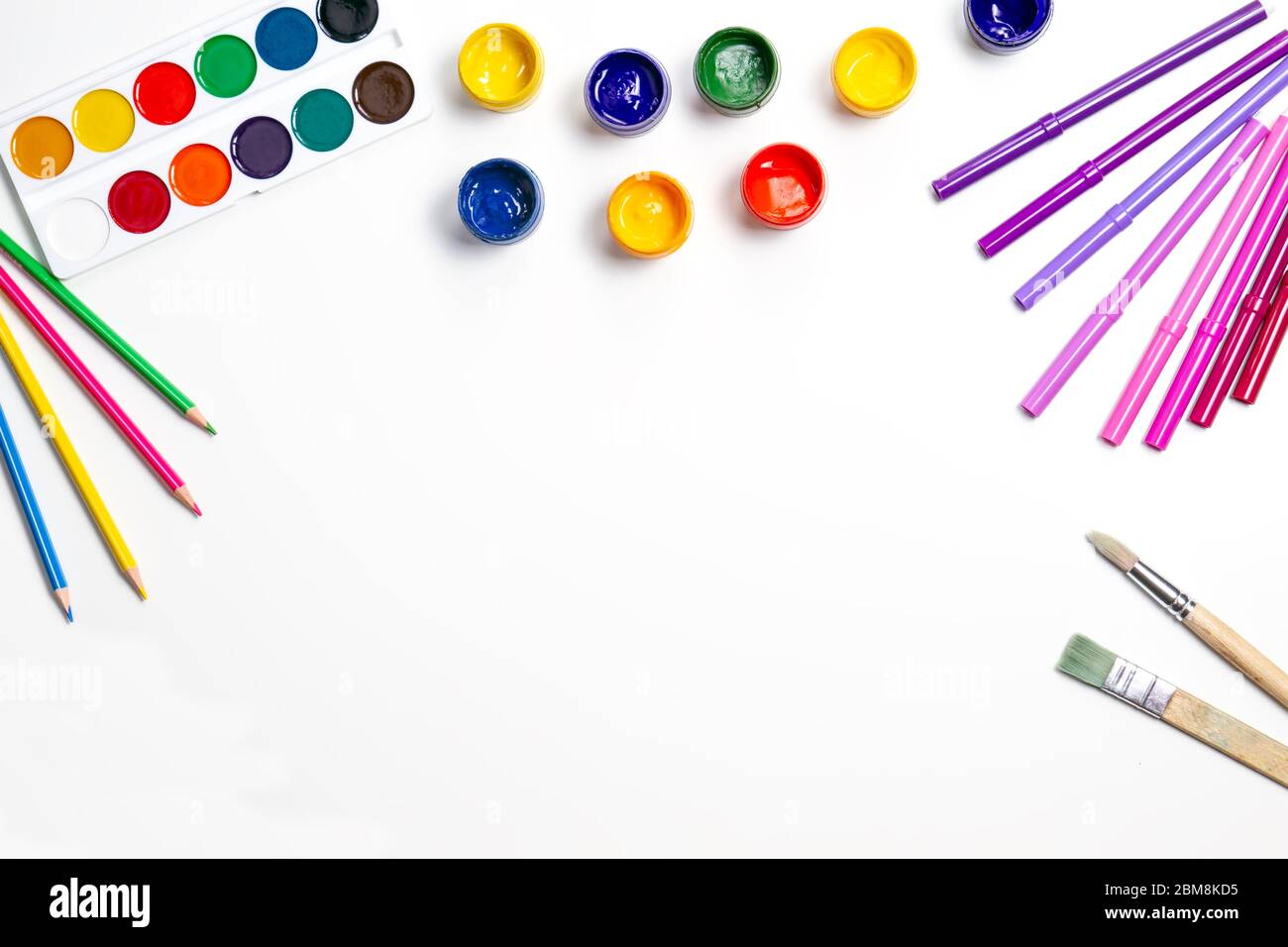 Creative background with pencils, water colors, art supplies on white ...