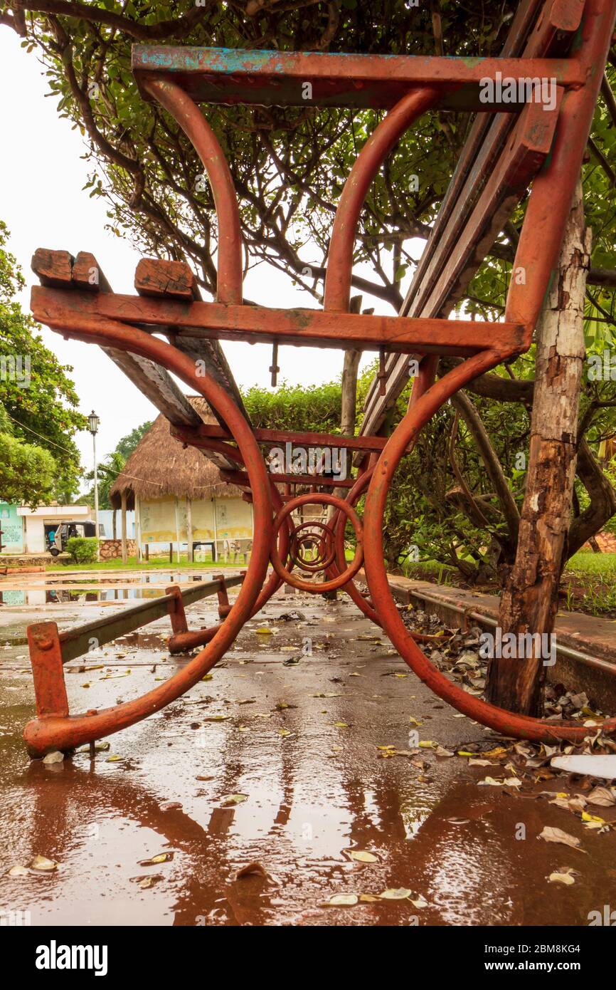 Abandoned benches in Yucatan Mexico no longer have seats, rainy ...