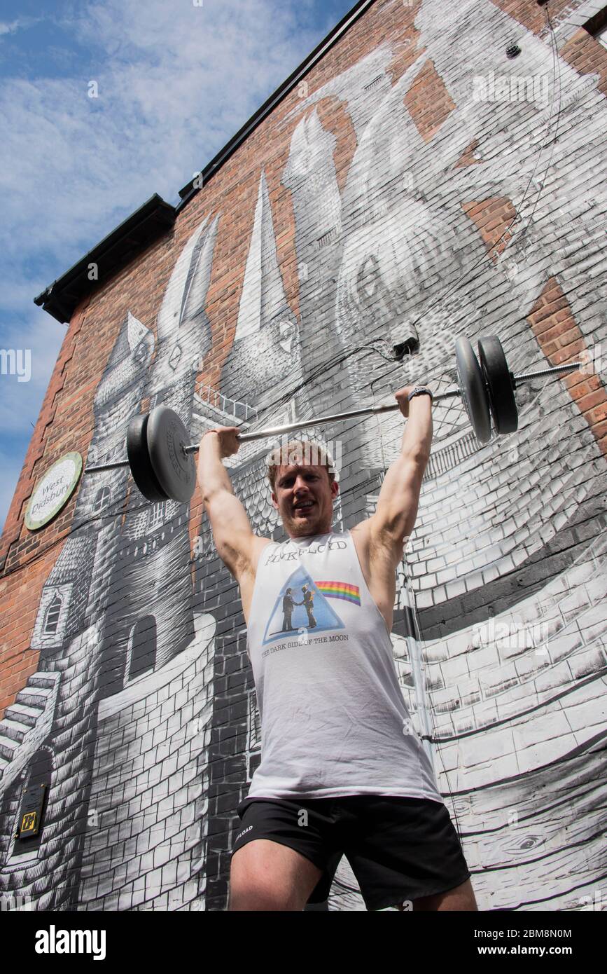 Manchester, UK. 7th May 2020. Joseph Corney exercises out doors keeping ...