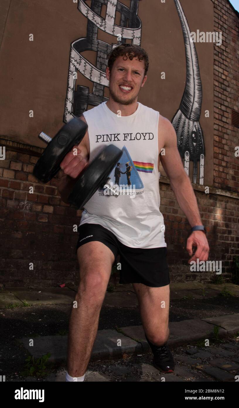 Manchester, UK. 7th May 2020. Joseph Corney exercises out doors keeping ...