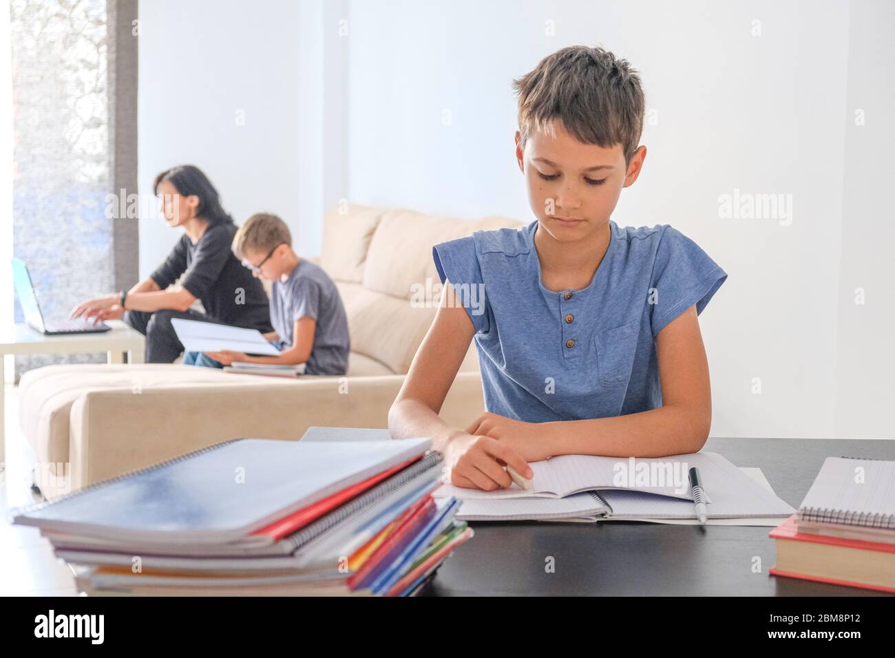 Work from home online learning parents hi-res stock photography and ...