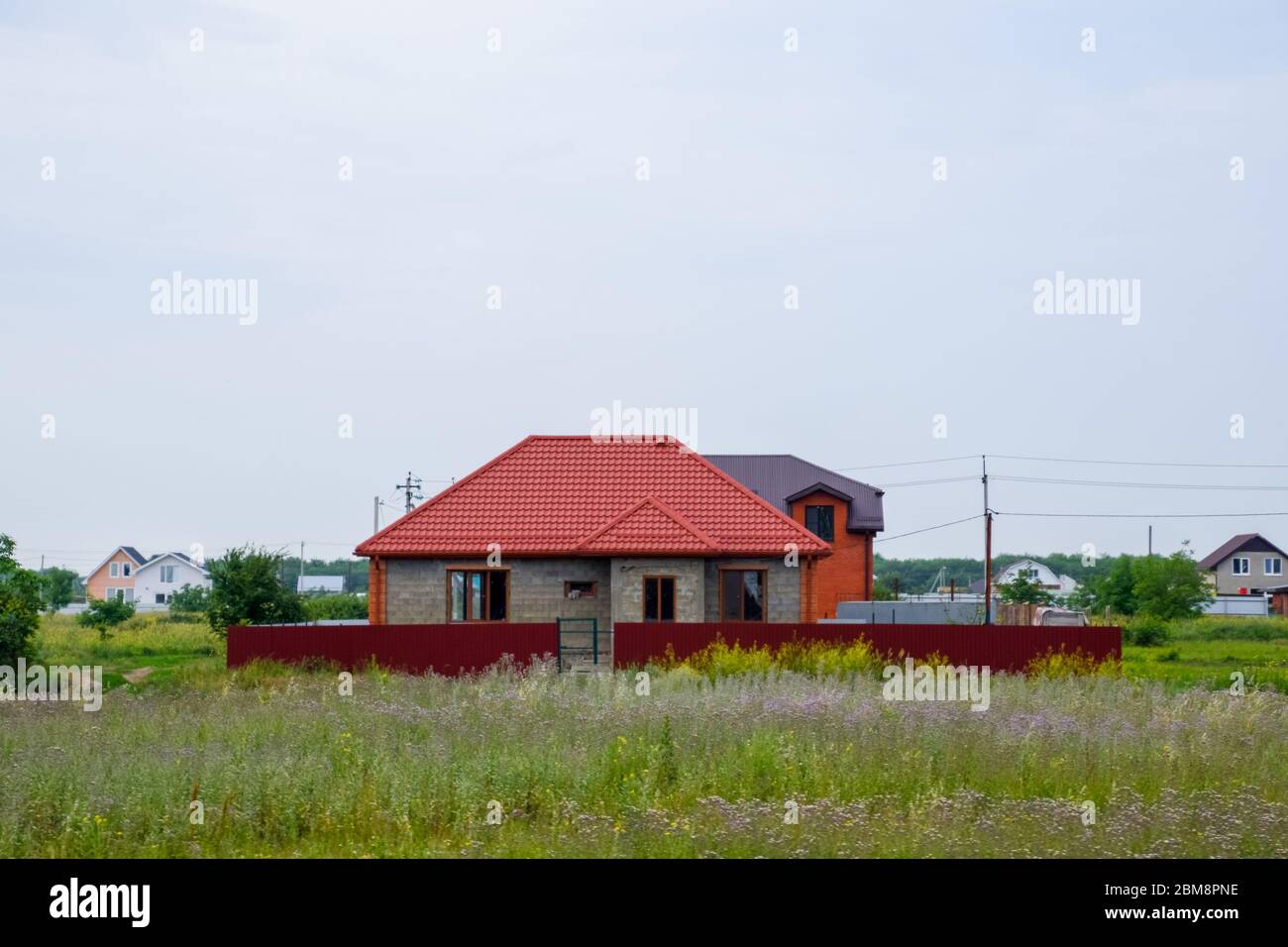 A cottage village of two-storey houses. Low-rise development Stock ...