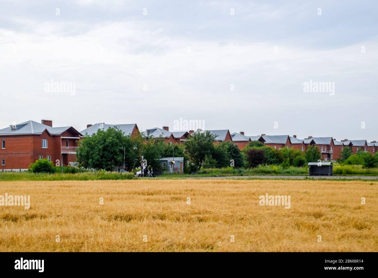 A cottage village of two-storey houses. Low-rise development Stock ...