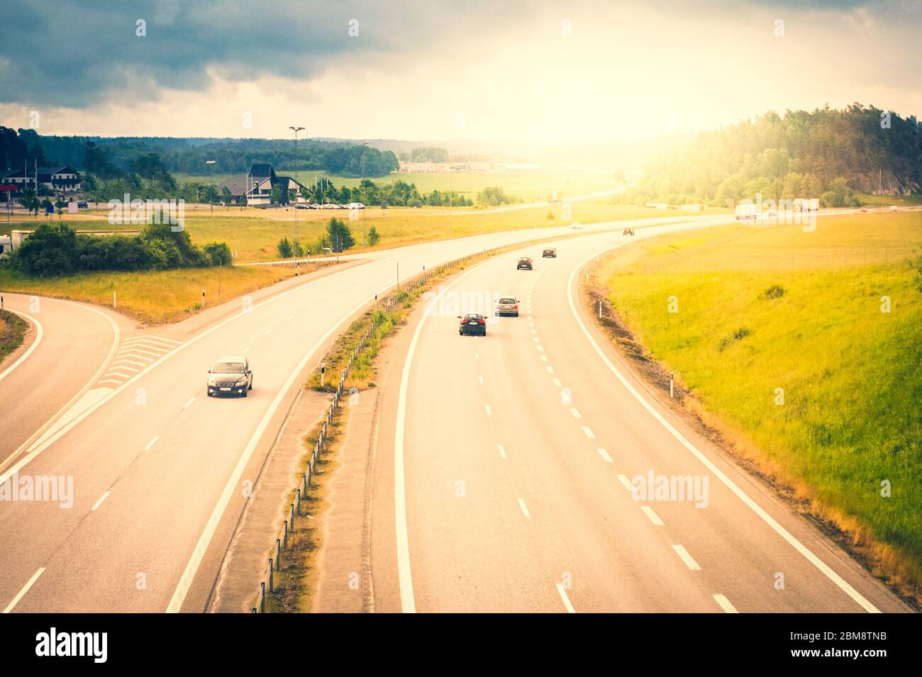 Three-lane highway, sky Stock Photo - Alamy