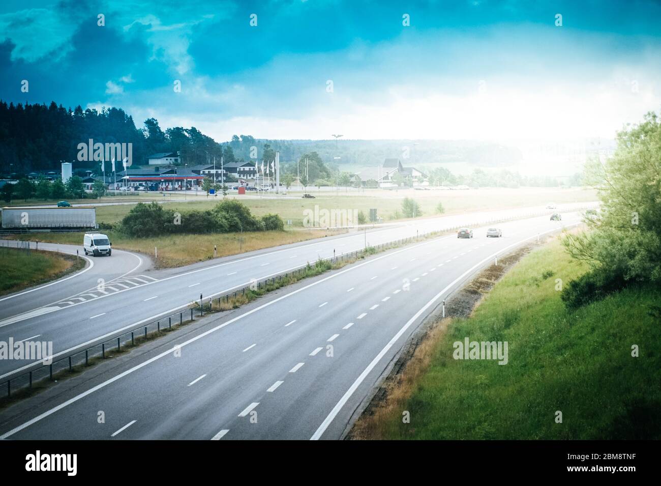 Three-lane highway, sky Stock Photo - Alamy