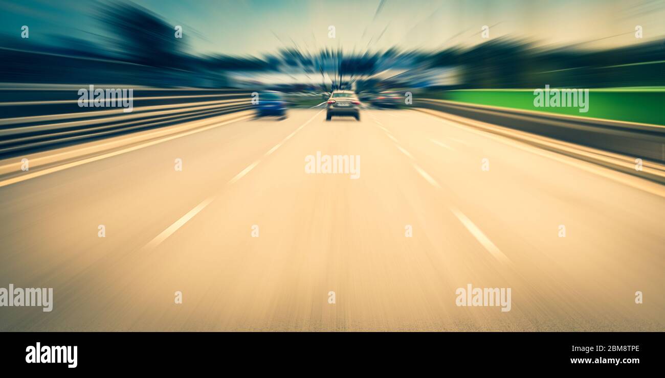 Driving on a highway Stock Photo - Alamy
