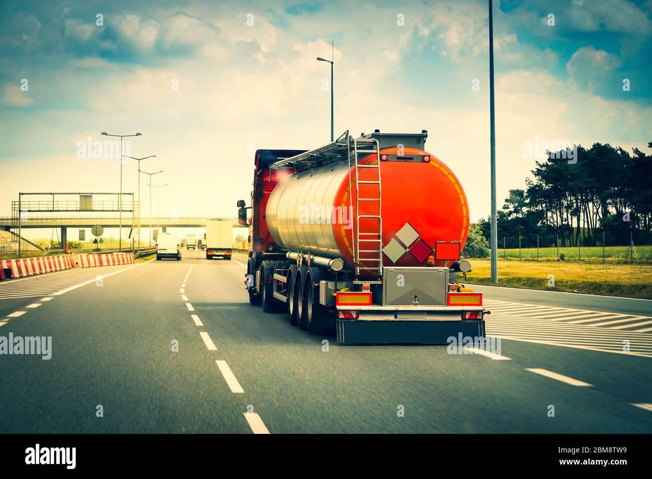 Tank car on a highway Stock Photo - Alamy