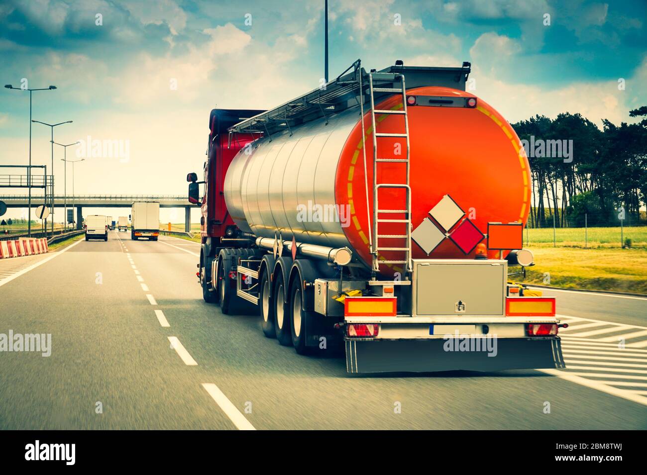 Tank car on a highway Stock Photo - Alamy