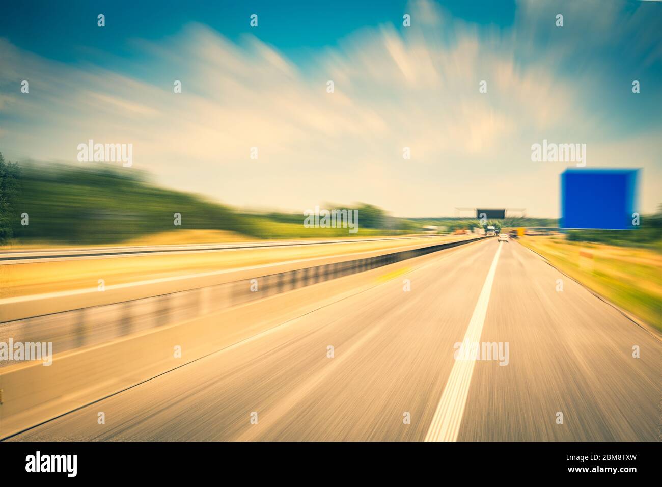 Driving on a highway Stock Photo - Alamy