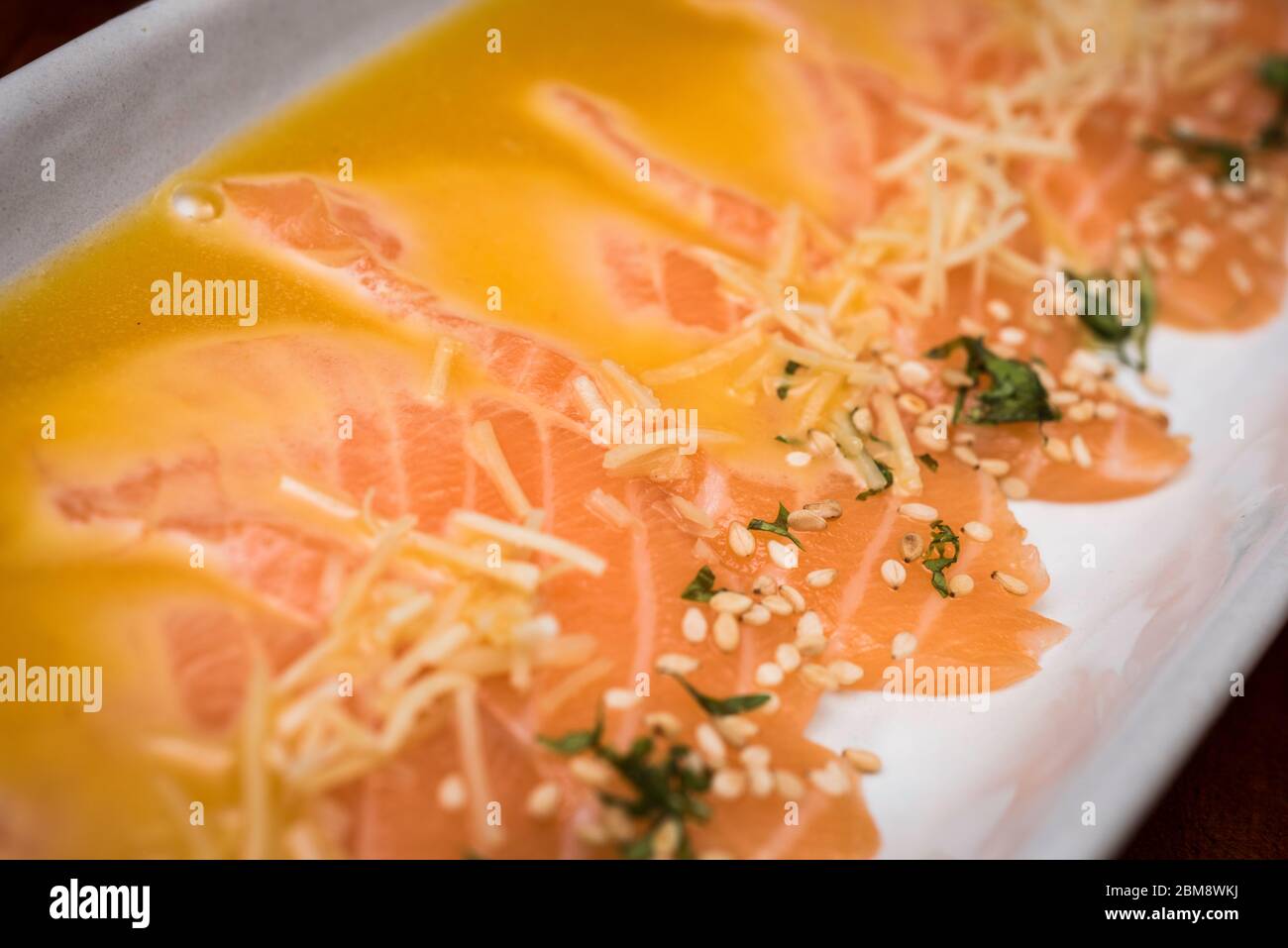tiradito de salmon - Peruvian dish of raw fish, carpaccio Stock Photo ...