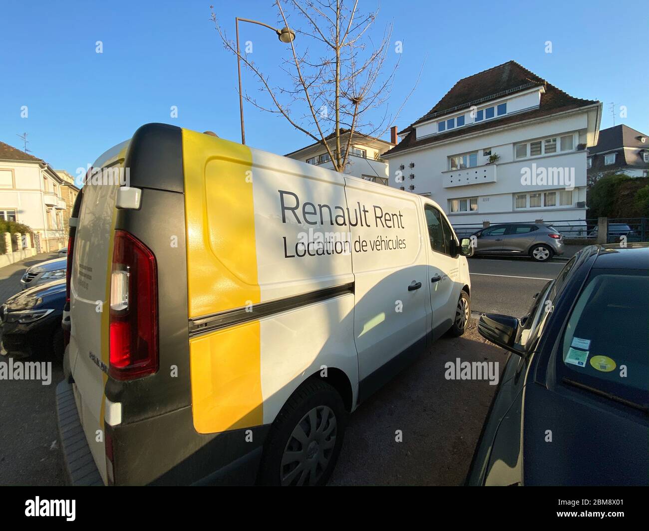 Paris, France - Feb 8, 2020: Rear view of Renault rent white van parked ...