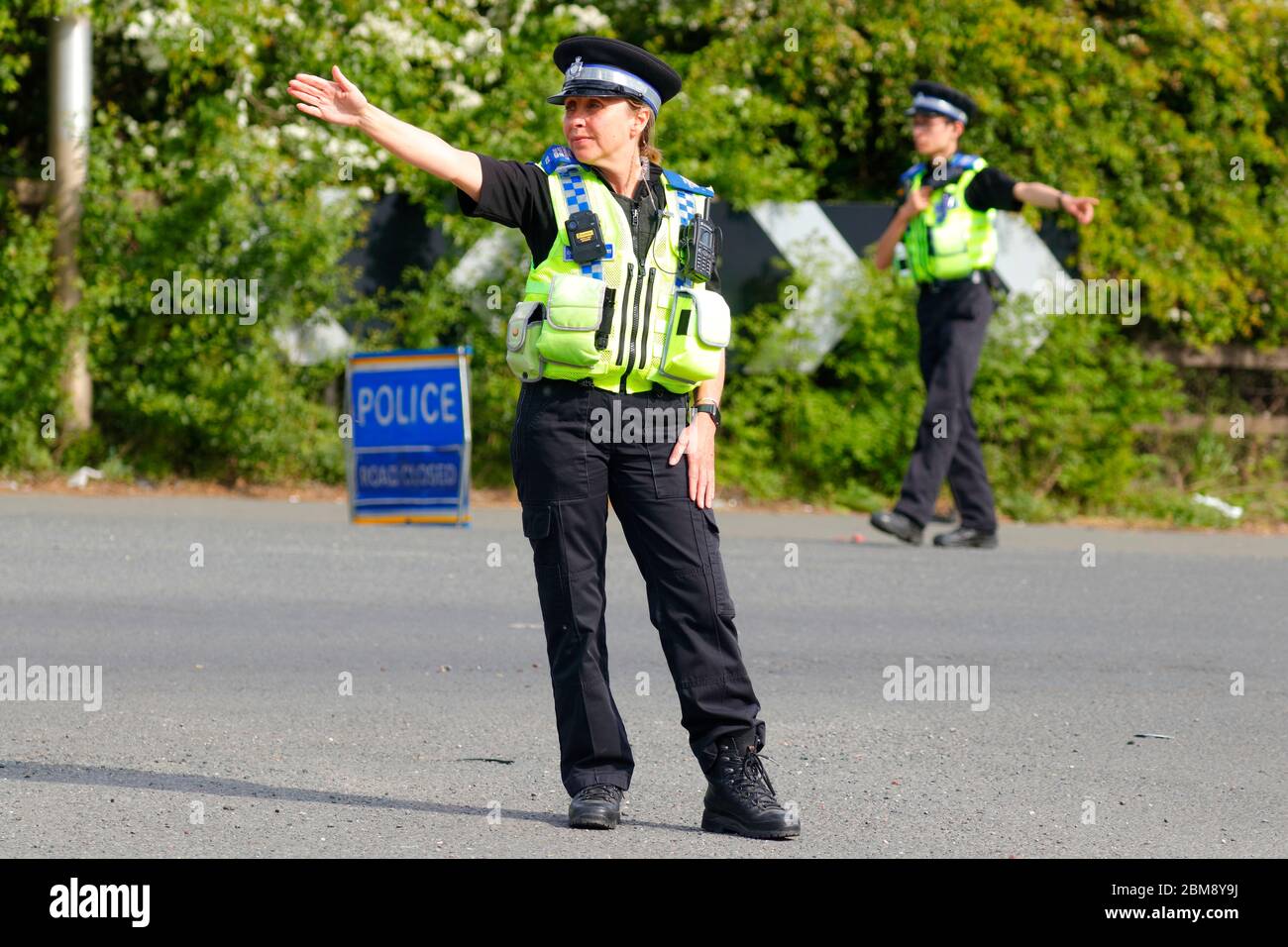 Police Officers Directing Traffic Away From A Police Incident On police-officers-directing-traffic-away-from-a-police-incident-on