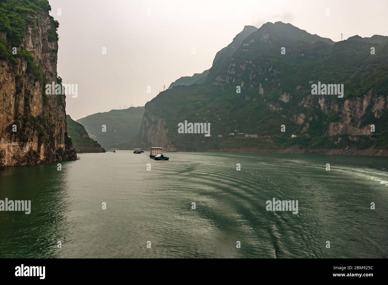 Zigui, China - May 6, 2010: Xiling gorge on Yangtze River. barges on ...