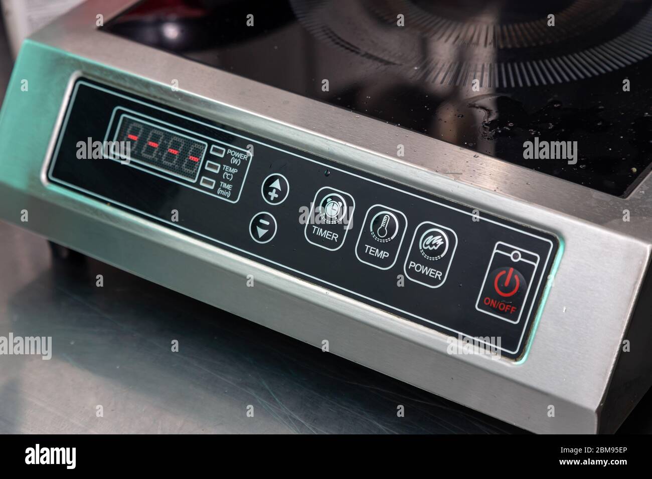 Close-up of the power button, temperature changes and other settings on ...