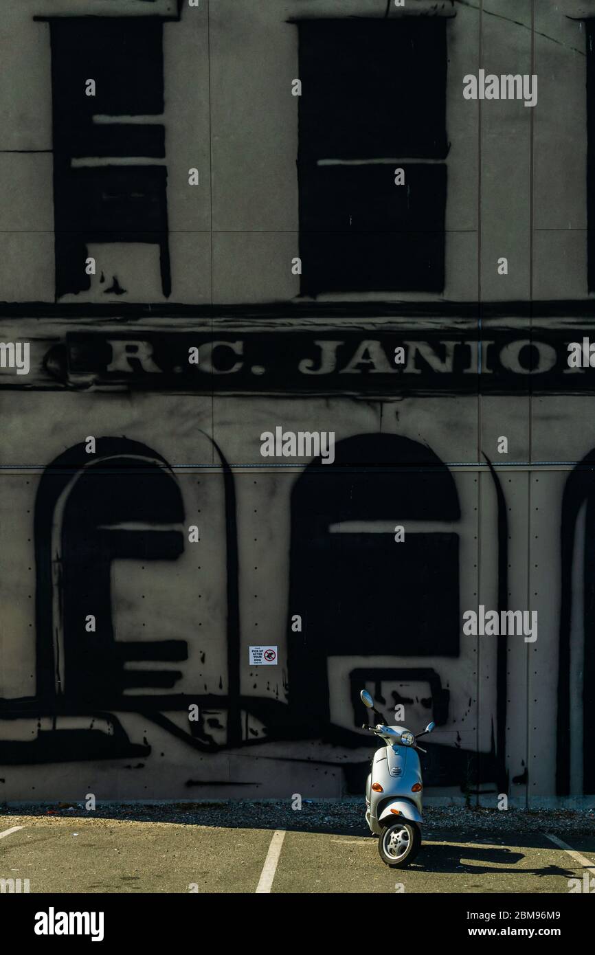 VICTORIA, CANADA - JULY 14, 2019: motor scooter parked near The Janion ...