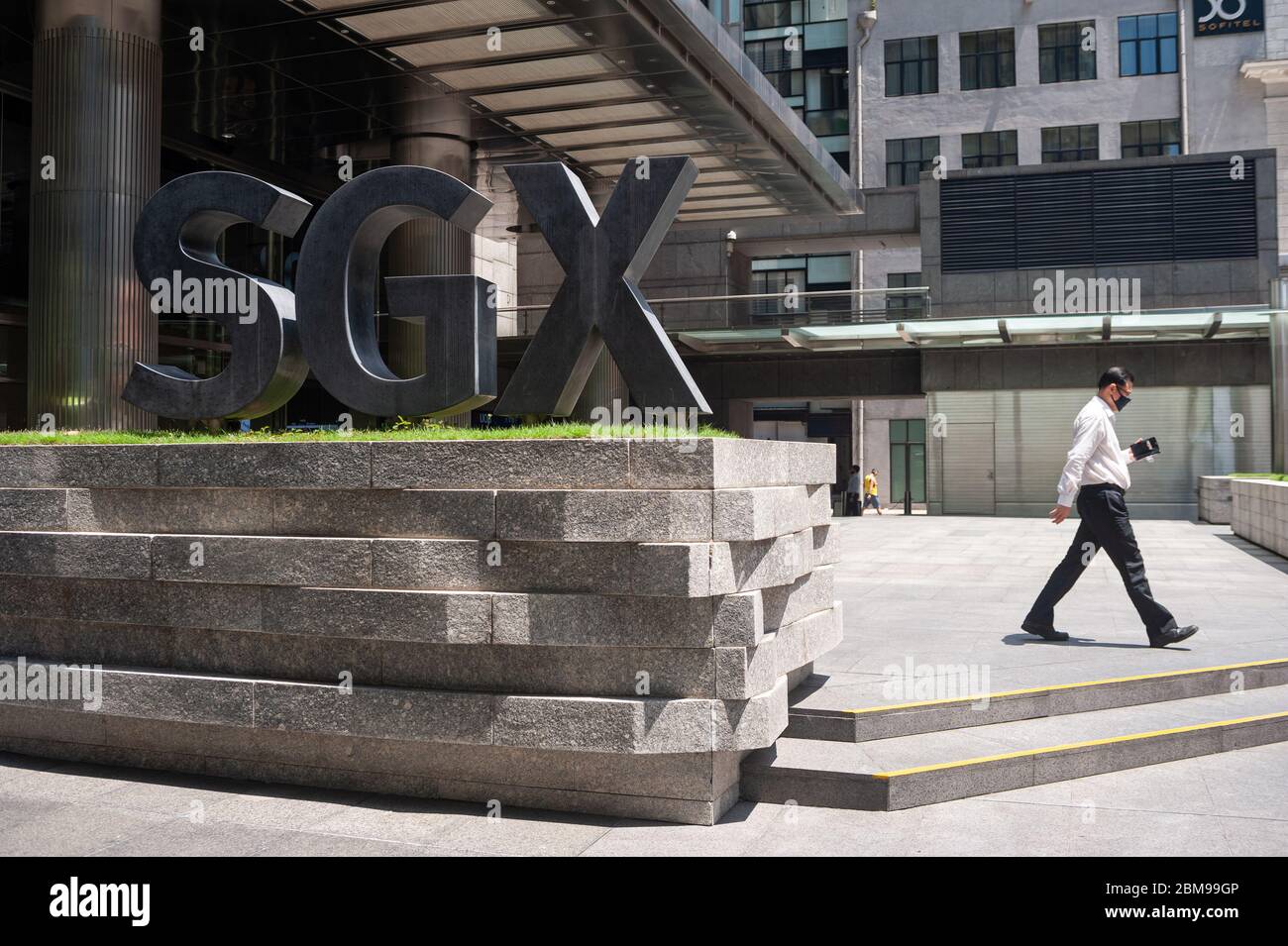 05.05.2020, Singapore, Republic of Singapore, Asia - A man walks by the ...
