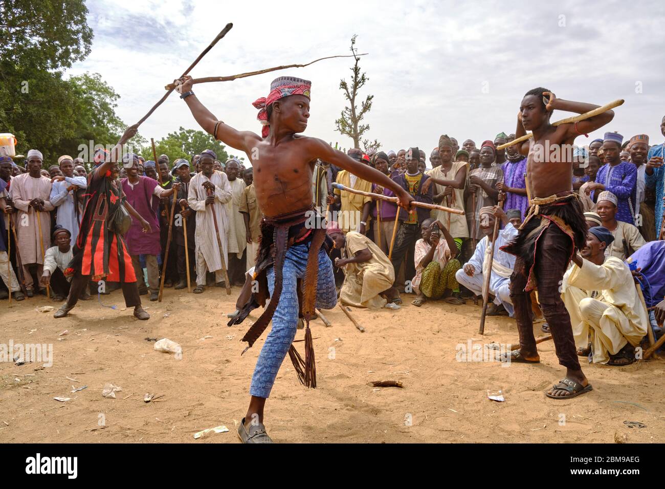 Young Fulani men fighting in a Sharo festival. Sharo is a Fulani ...