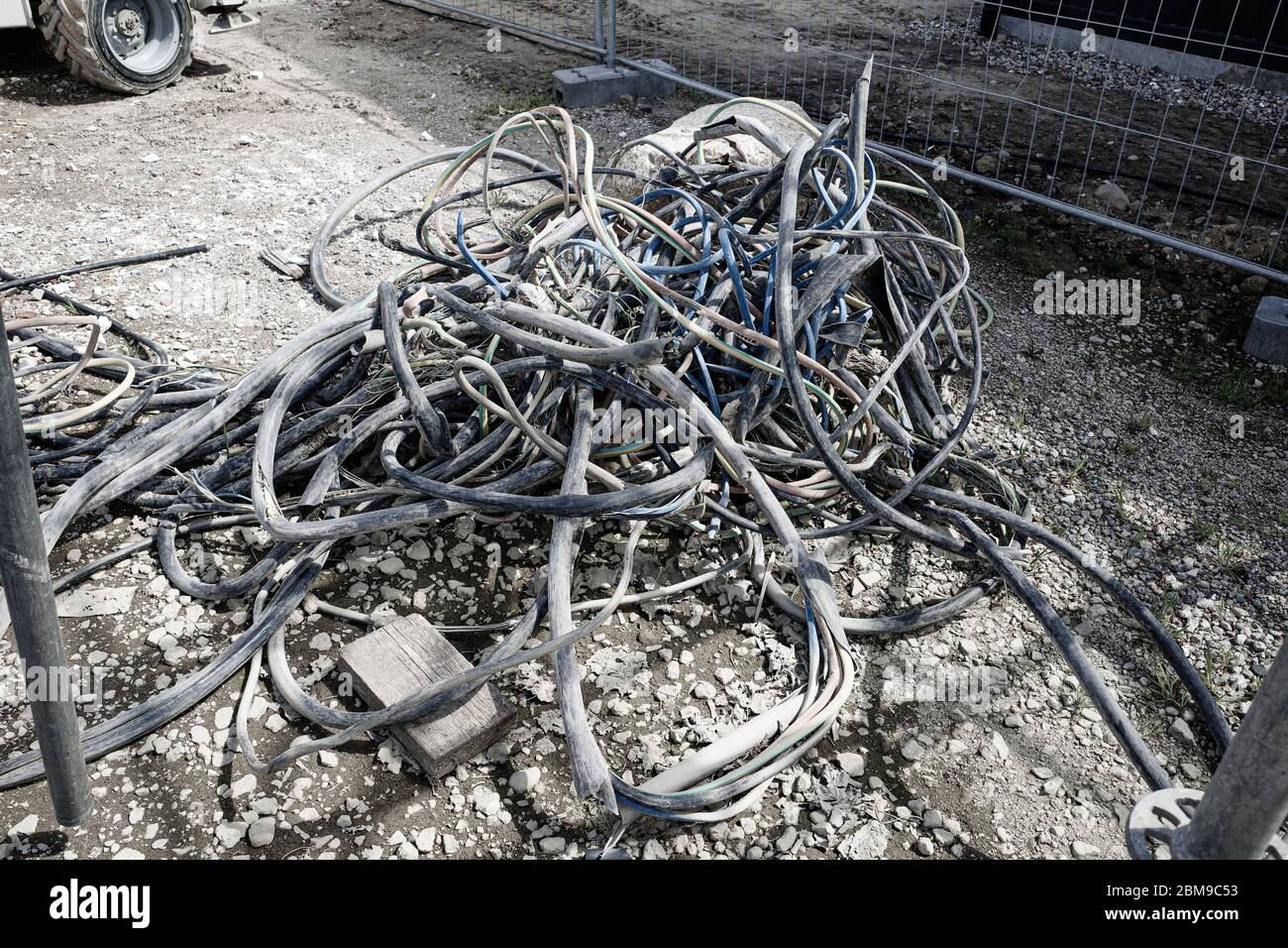on a construction site a pile of old electric cables Stock Photo - Alamy