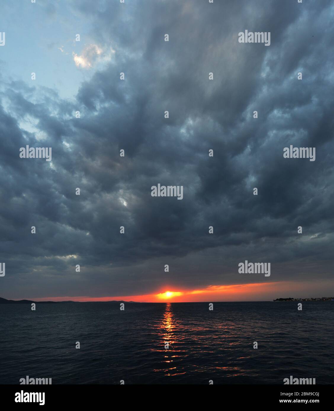 A romantic sunset seen from the promenade in Zadar, Croatia Stock Photo ...