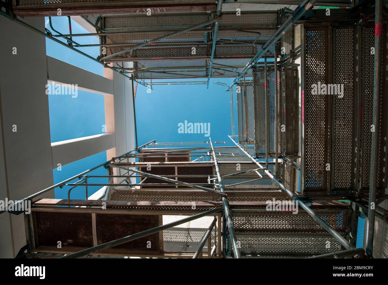 a building shaft is scaffolded on a construction site Stock Photo - Alamy
