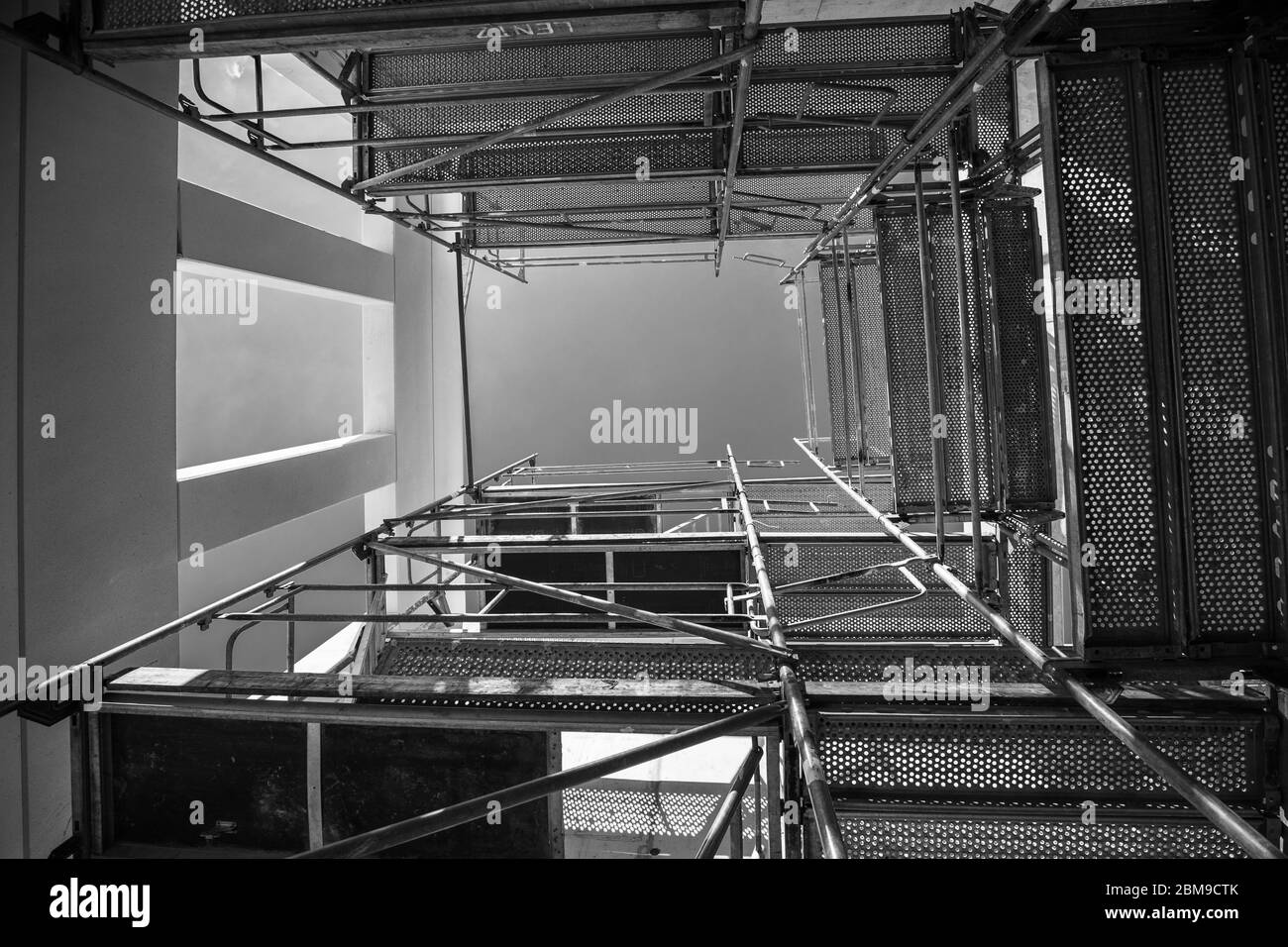 a building shaft is scaffolded on a construction site Stock Photo - Alamy
