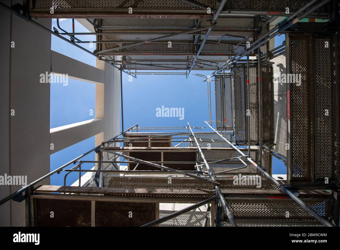 a building shaft is scaffolded on a construction site Stock Photo - Alamy