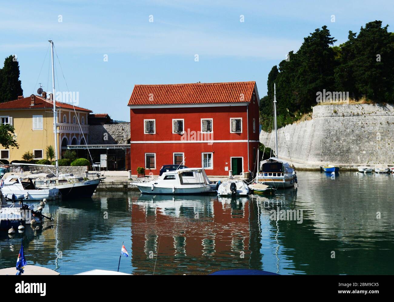 The Fosa Marina ( Lučica Foša ) by the walls of the old town of Zadar ...