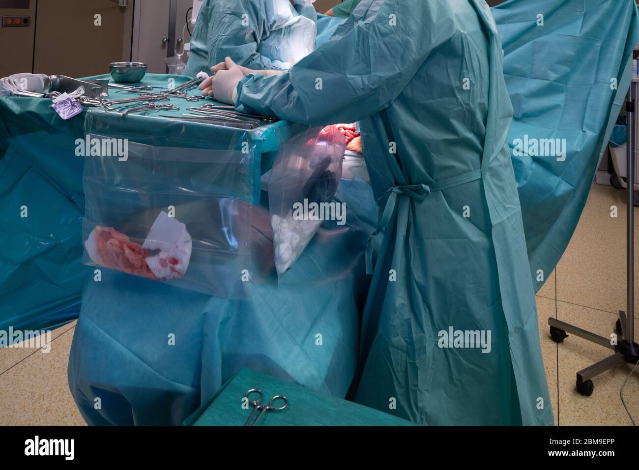 a surgical team performs a surgical abdominal operation Stock Photo - Alamy