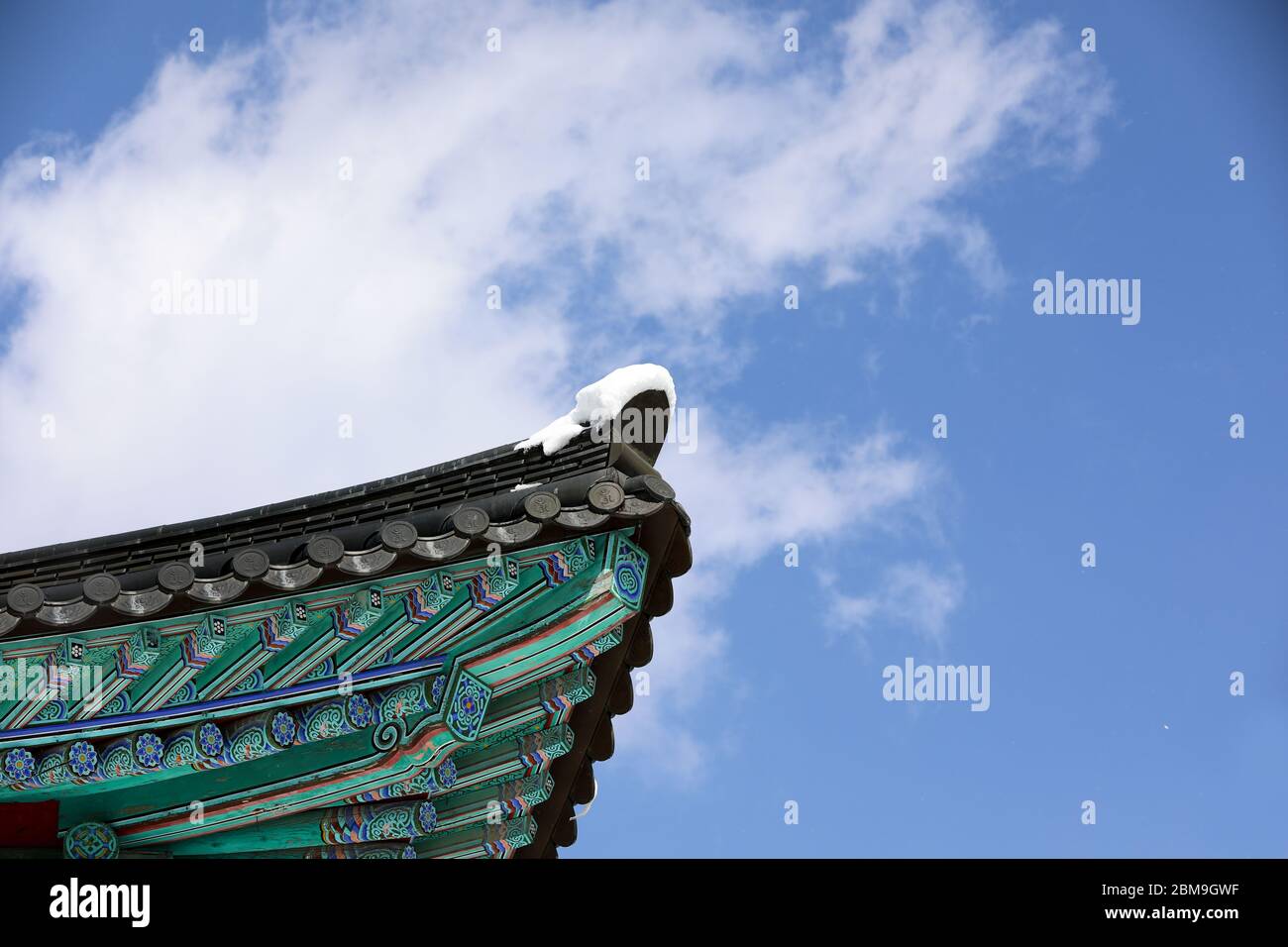 Korean traditional temple roof covered in snow Stock Photo - Alamy