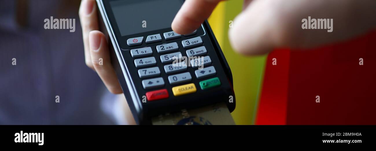 Male hand cuonter push button on modern POS terminal Stock Photo - Alamy