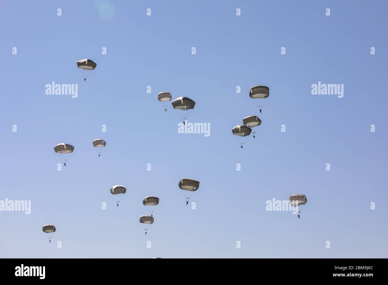 Paratroopers of the 82nd Airborne Division descend after jumping from ...